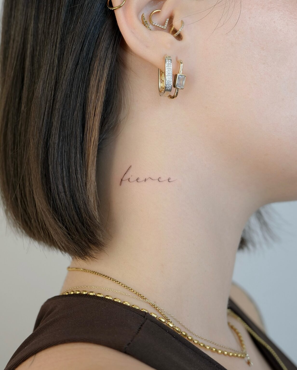 40+ Beautiful Women’s Neck Tattoos to Inspire